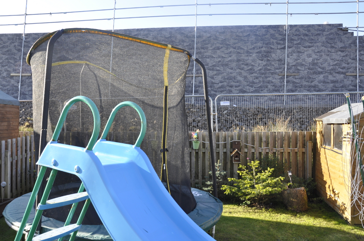 West Coast Today - News - Residents concerned over 'prison wall' at ...