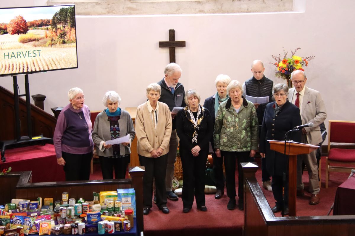 West Coast Today - News - Church group harvests goods for food bank