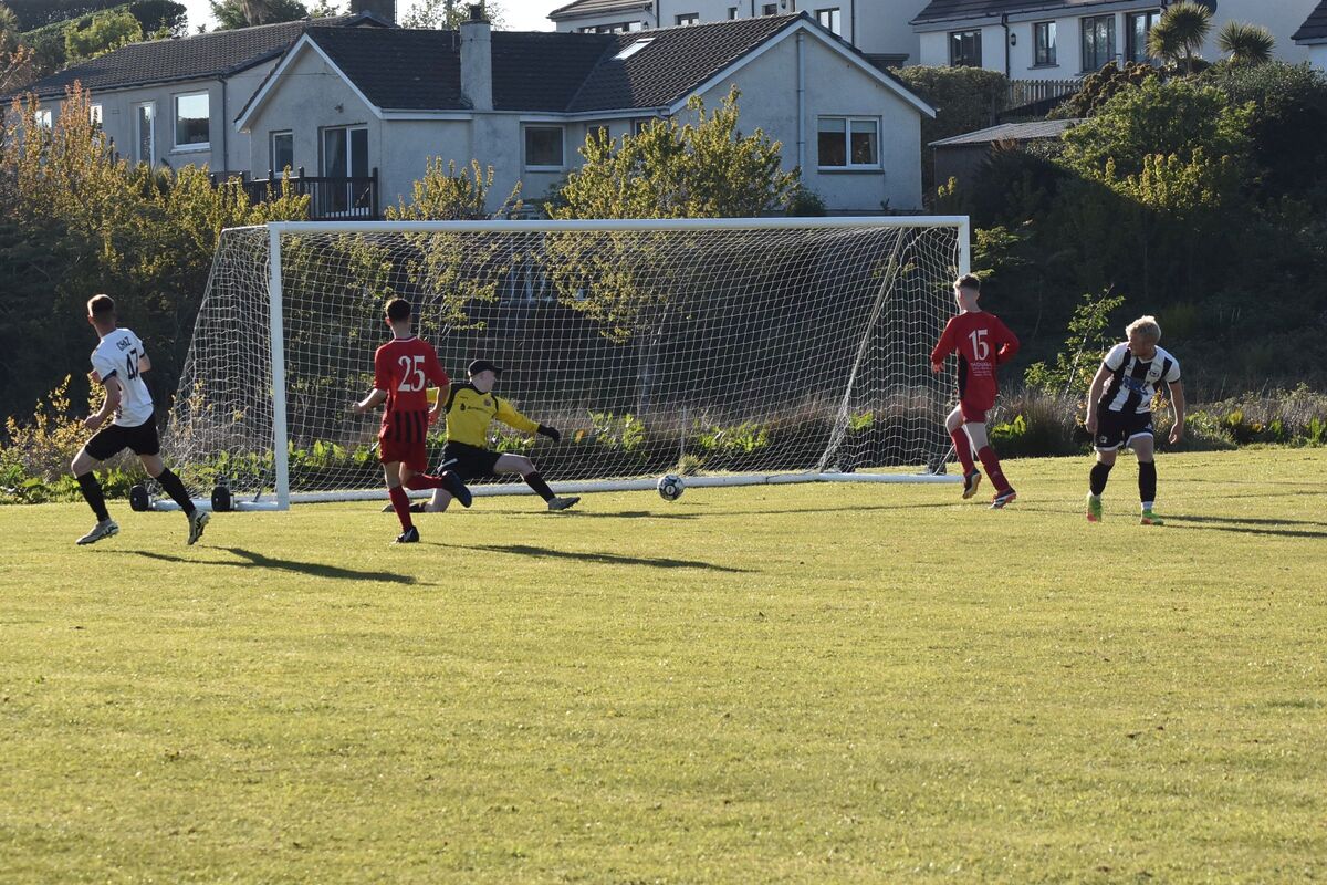West Coast Today - Media Library - Charlie Ross edges the ball past the ...
